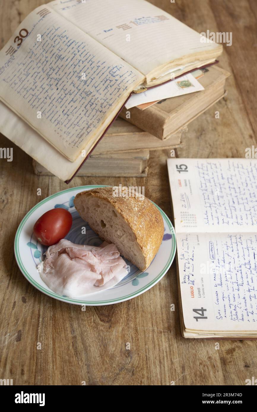 fast menu with bread and cooked ham while studying Stock Photo - Alamy