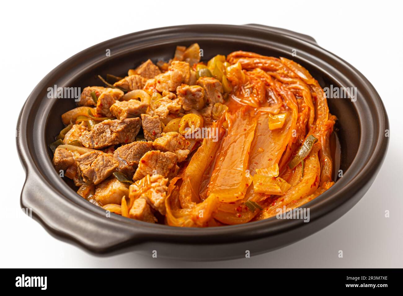Pork aged kimchi steamed dish on white background Stock Photo - Alamy