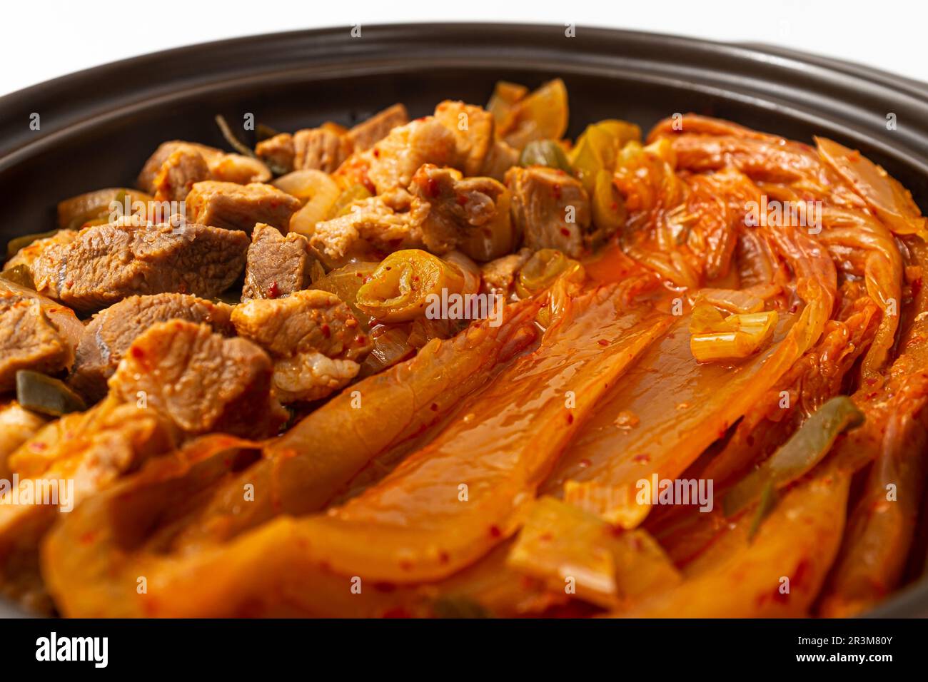 Pork aged kimchi steamed dish on white background Stock Photo - Alamy