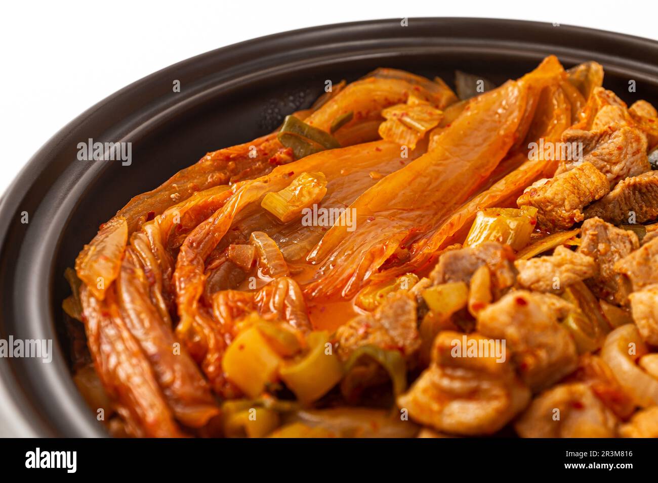 Pork aged kimchi steamed dish on white background Stock Photo - Alamy