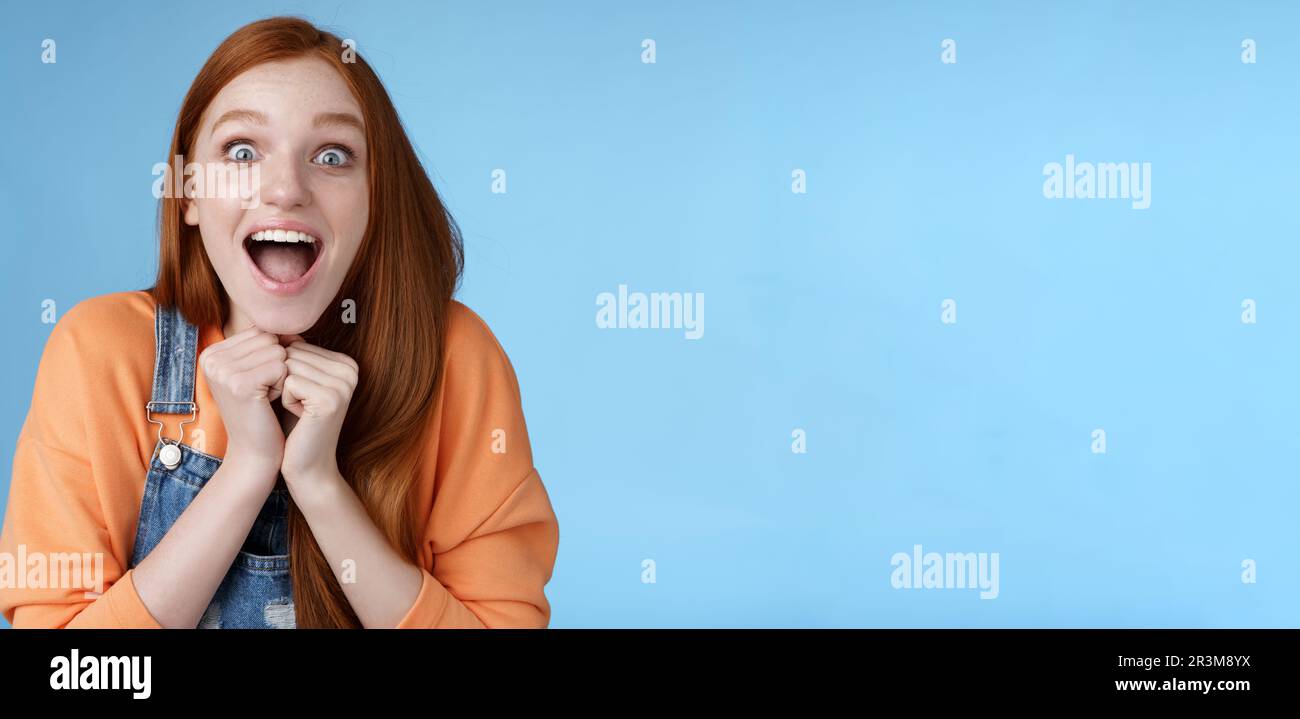 Cute redhead european girl blue eyes freckles reacting amused shocking ...