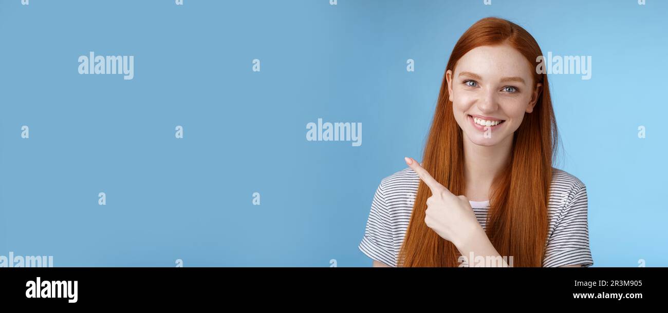 Close-up attractive gentle tender friendly-looking smiling redhead ...