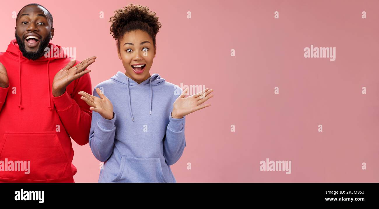 Impressed happy thrilled young pair african man woman relationship ...