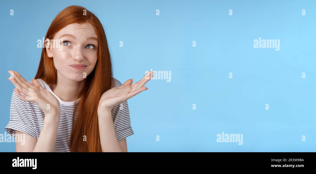 Awkward uncomfortable attractive redhead popular girl trying think up ...