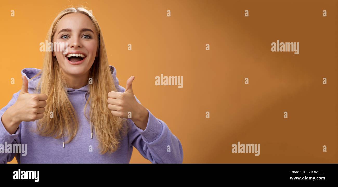 Supportive cute blond girlfriend cheering liking interesting concept ...