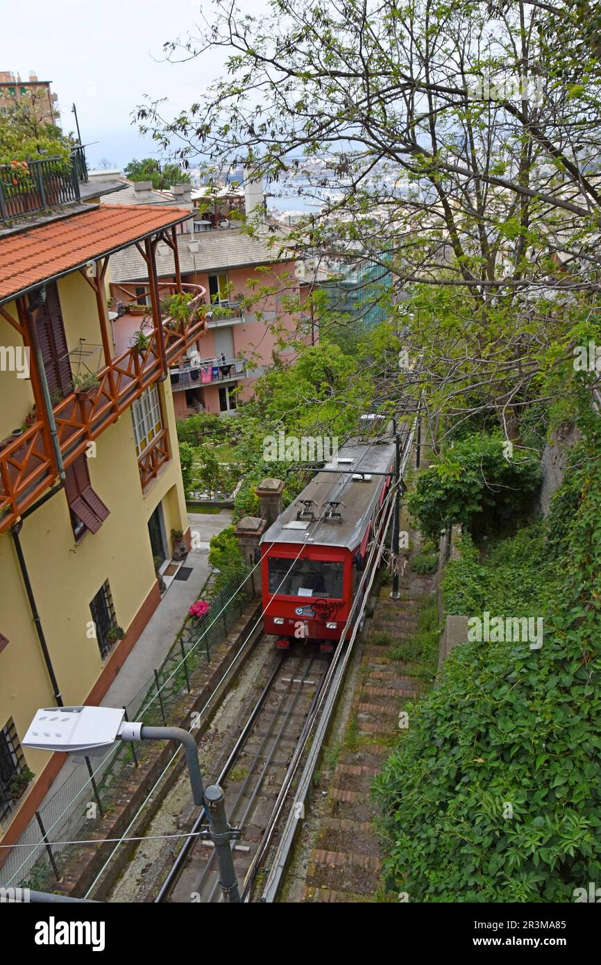 Train arriving at San Simone station on the Zecca-Righi funicular cable ...