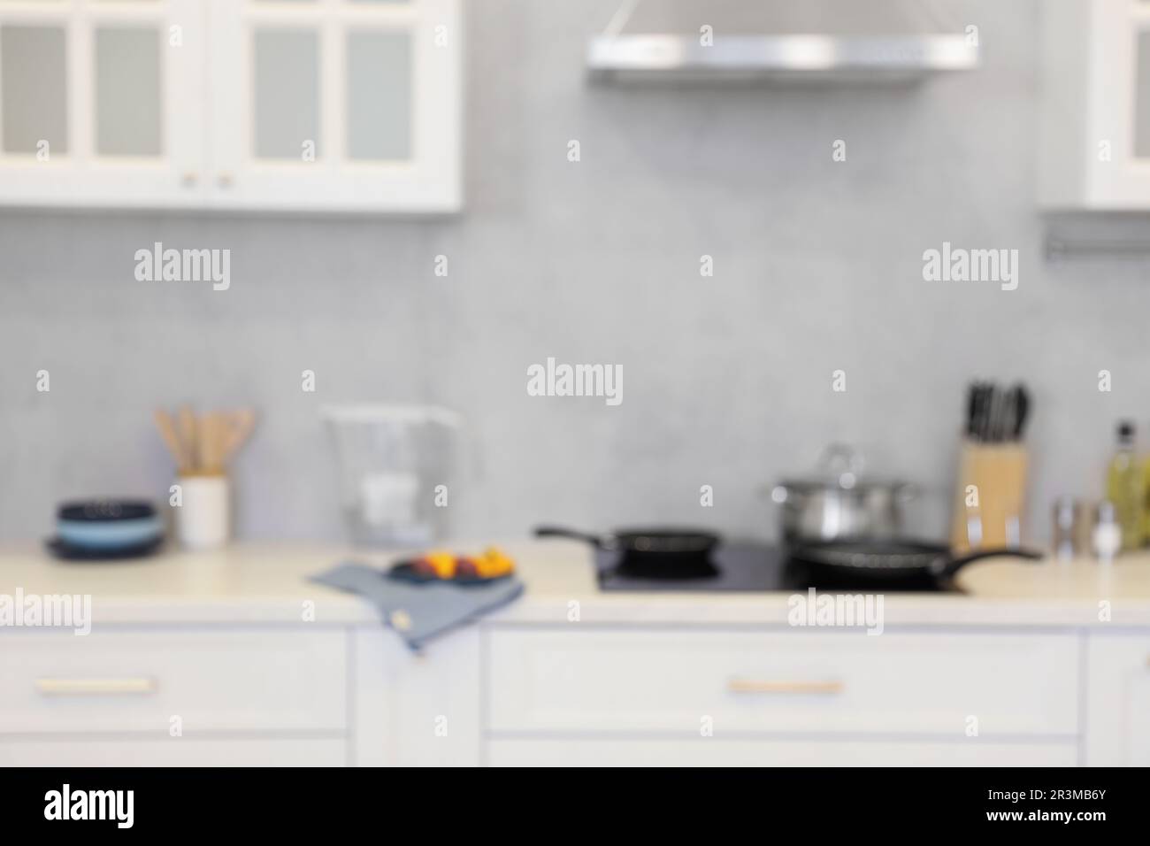 Blurred view of modern kitchen. Interior design Stock Photo - Alamy