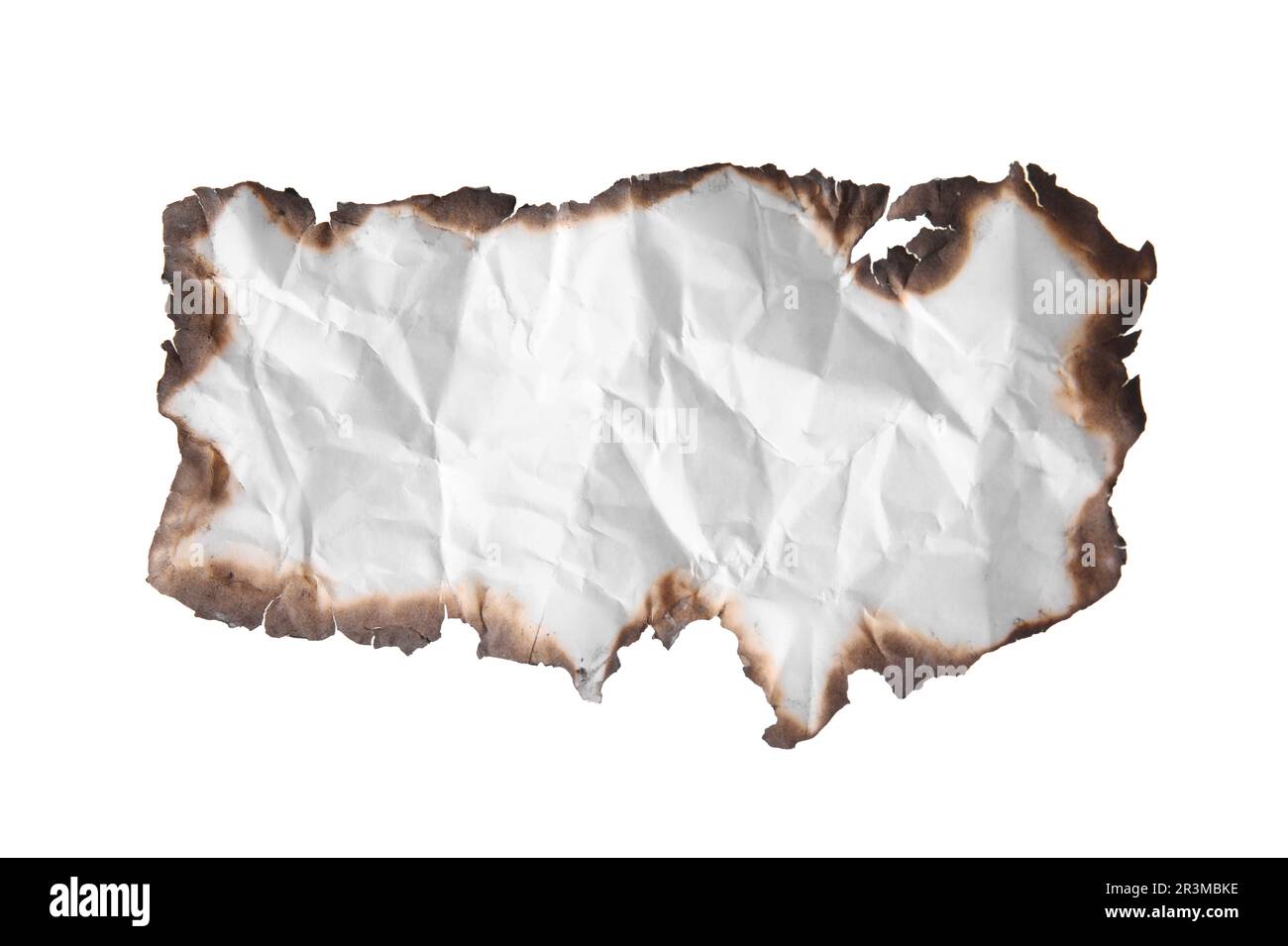 Piece of crumpled paper with dark burnt borders on white background ...