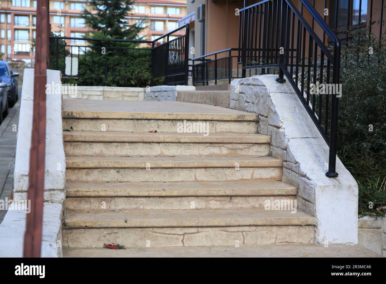 View of beautiful stone stairs with metal handrails outdoors Stock ...