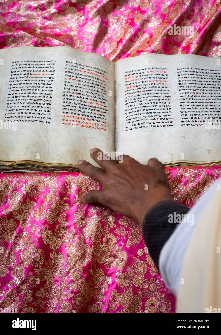Ethiopian orthodox priest with an old bible in nakuto lab rock church ...