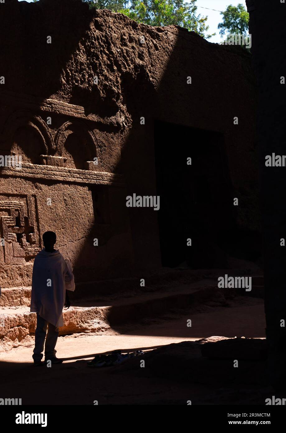 Ethiopian man outside Biete Meskel rock-hewn church, Amhara Region ...