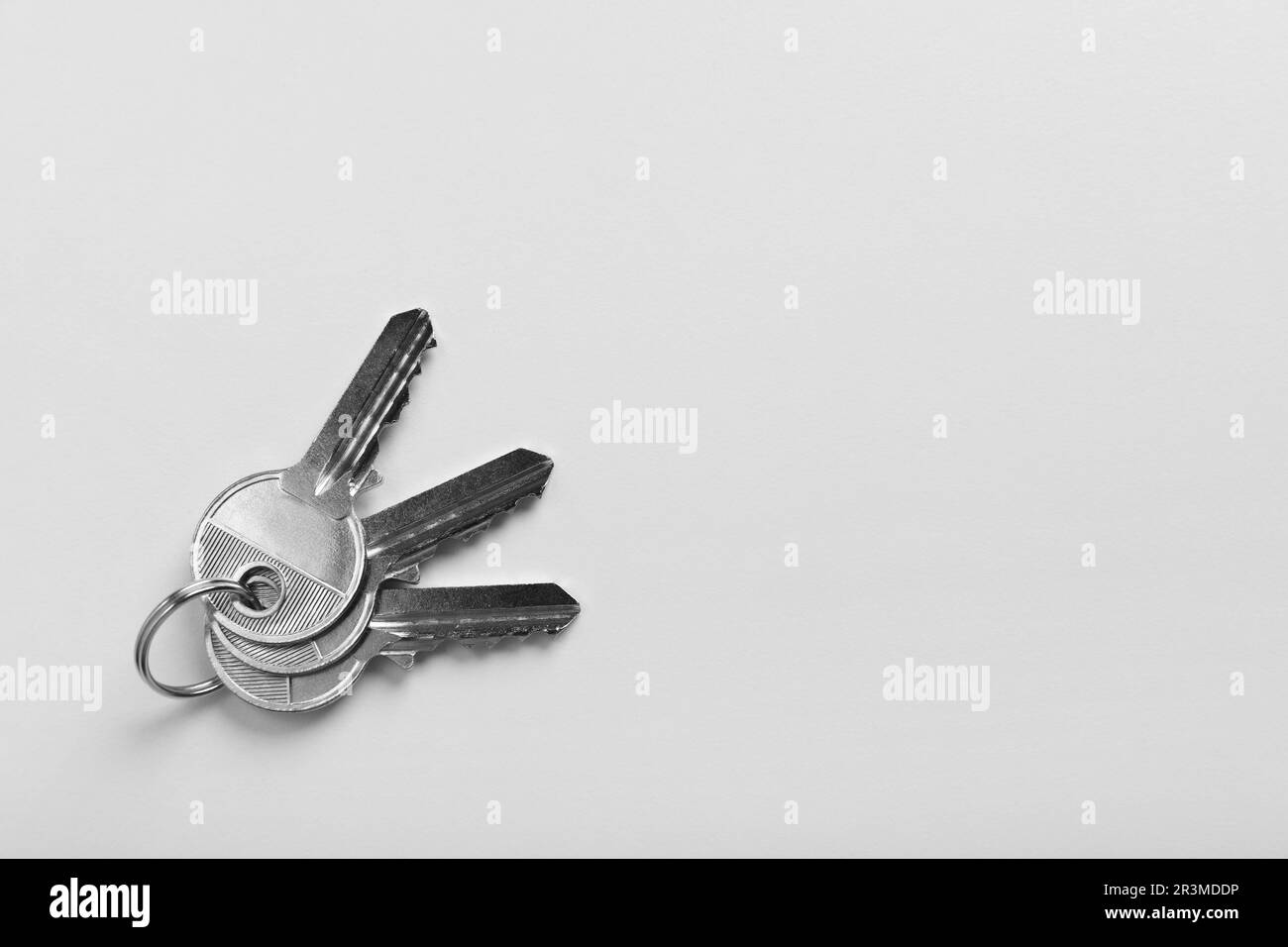 Keys on white background, top view and space for text. Real estate ...