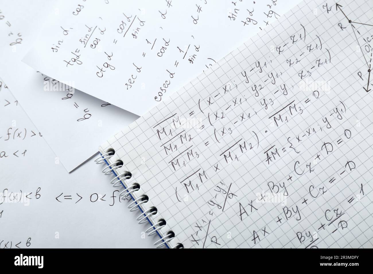 Sheets of paper with different mathematical formulas, top view Stock ...