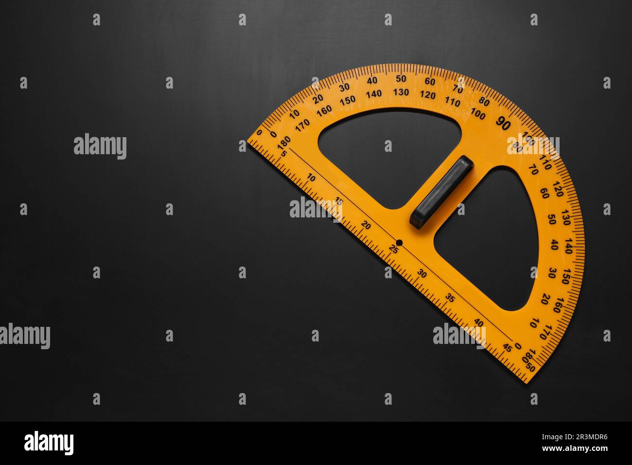 Yellow protractor on blackboard, top view. Space for text Stock Photo ...