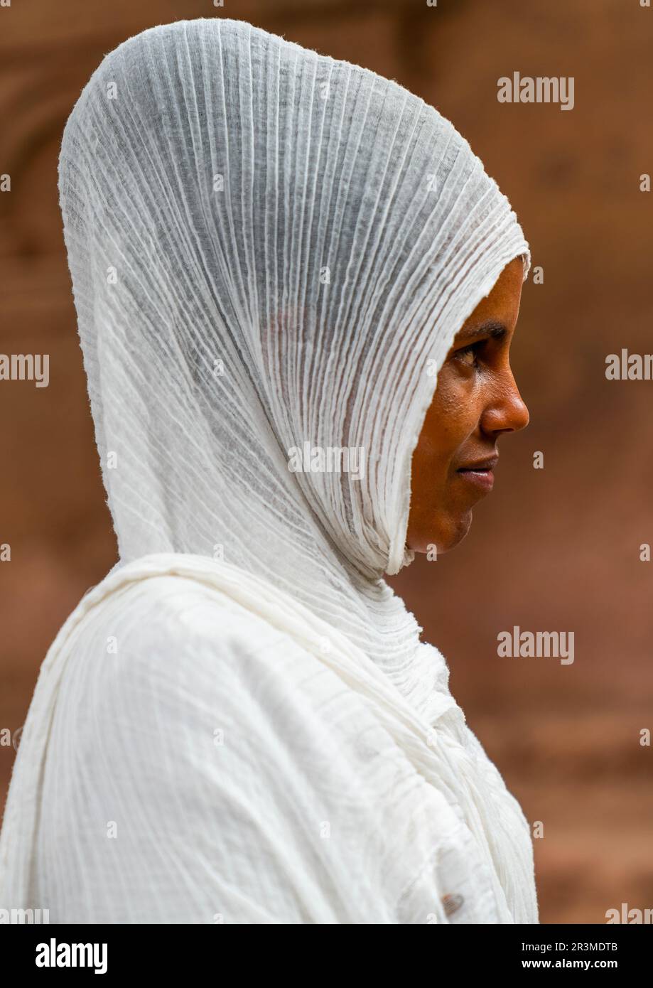 Ethiopian woman pilgrim with a white shawl, Amhara Region, Lalibela ...