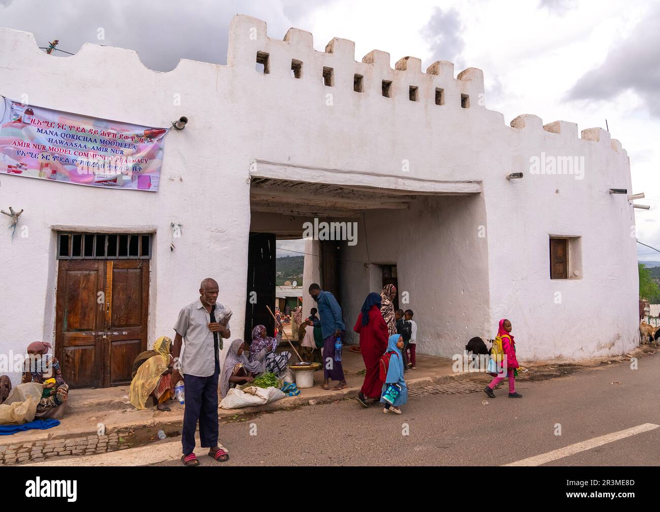 Women selling food in front of old Argoba beri gate of the town, Harari ...