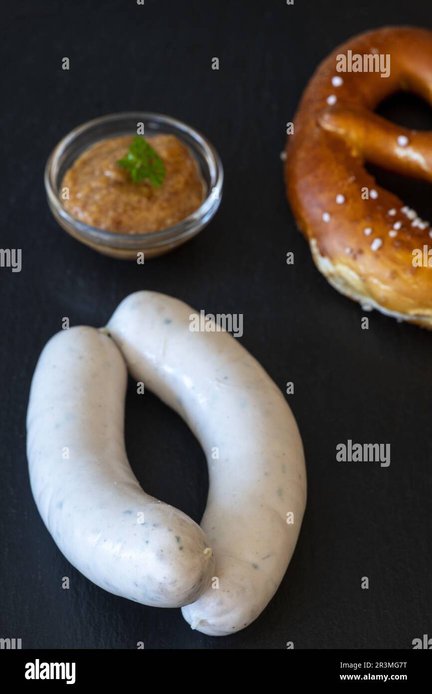 Bavarian veal sausage with mustard Stock Photo - Alamy