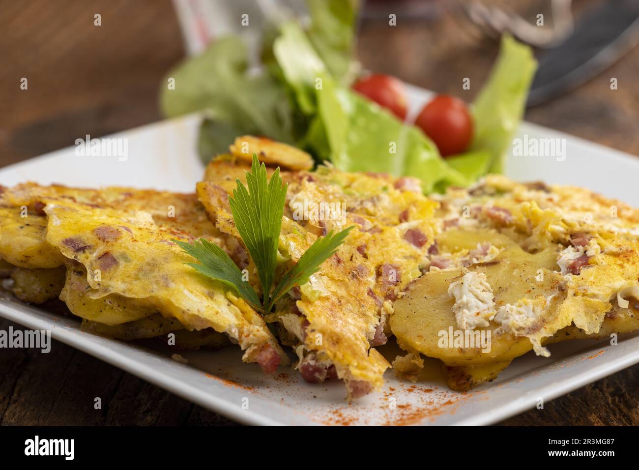 Tyrolean potato grÃƒÂ¶stl on a plate Stock Photo - Alamy