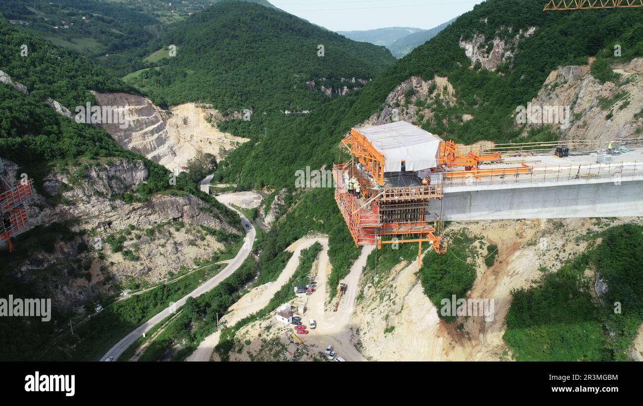 Aerial drone view on highway bridge road under construction ...