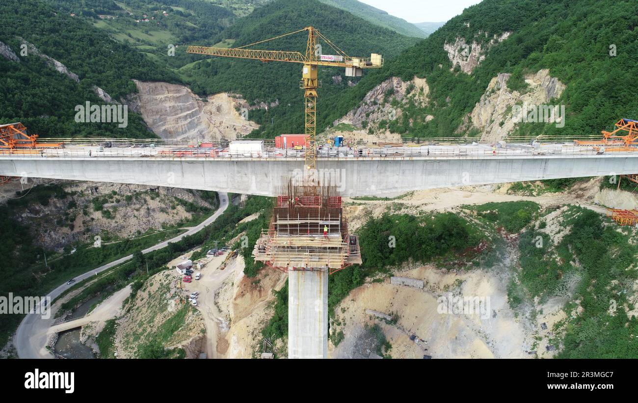 Aerial drone view on highway bridge road under construction ...