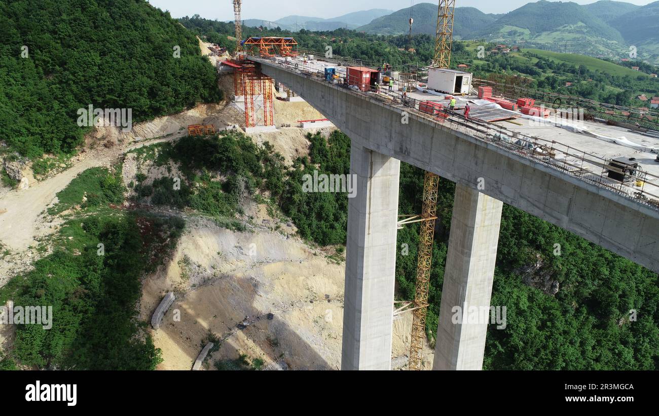Aerial drone view on highway bridge road under construction ...