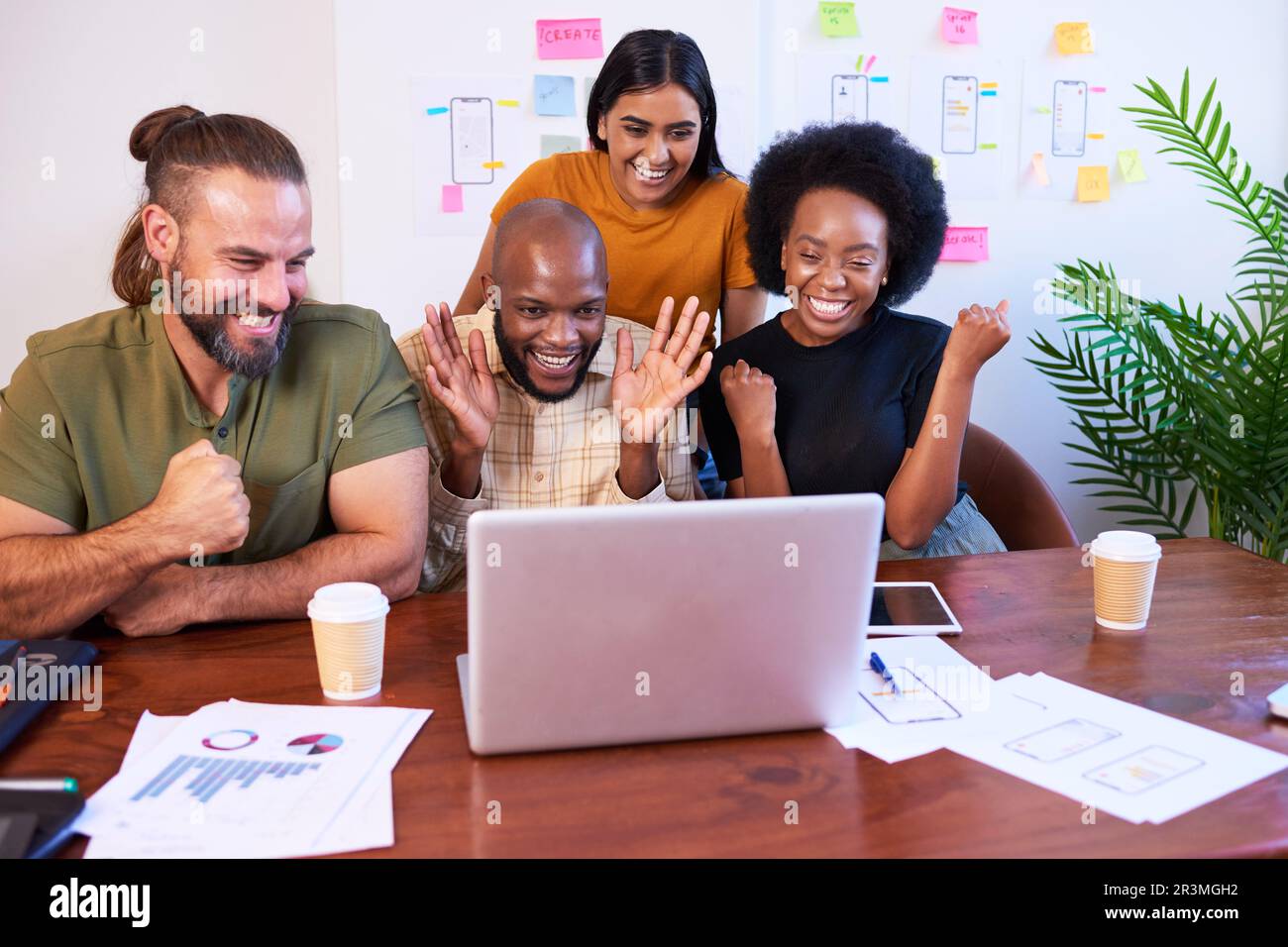 Four young members of tech start up join video call, group meeting ...