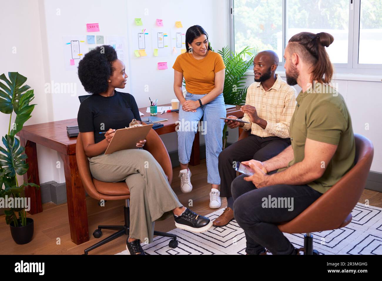 Four diverse multi racial colleagues hi-res stock photography and ...