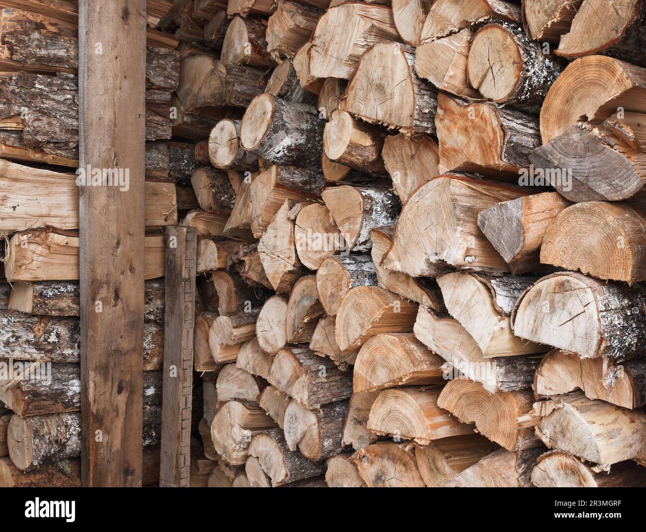 Split and stacked firewood ready for burning Stock Photo - Alamy