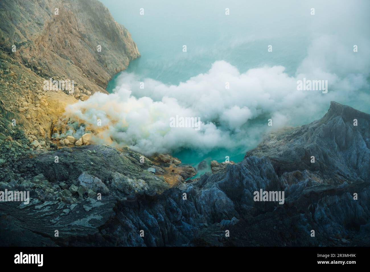 Sulfur miners inside crater of Ijen volcano, East Java, Indonesia Stock ...
