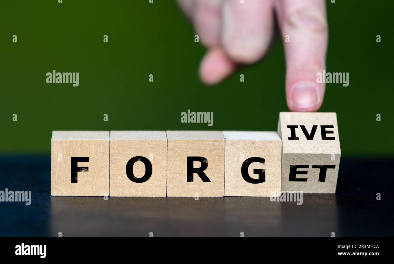Wooden cubes form the expression 'forgive and forget' Stock Photo - Alamy