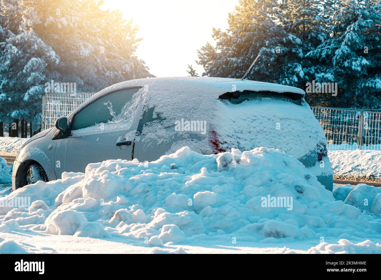 The car parked on the street after heavy snowfall Stock Photo - Alamy