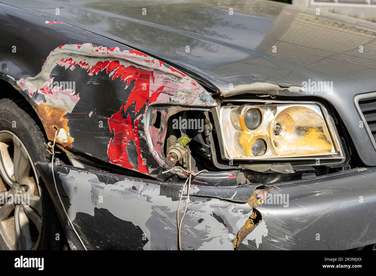 a car with a damaged wing. a car after a collision Stock Photo - Alamy