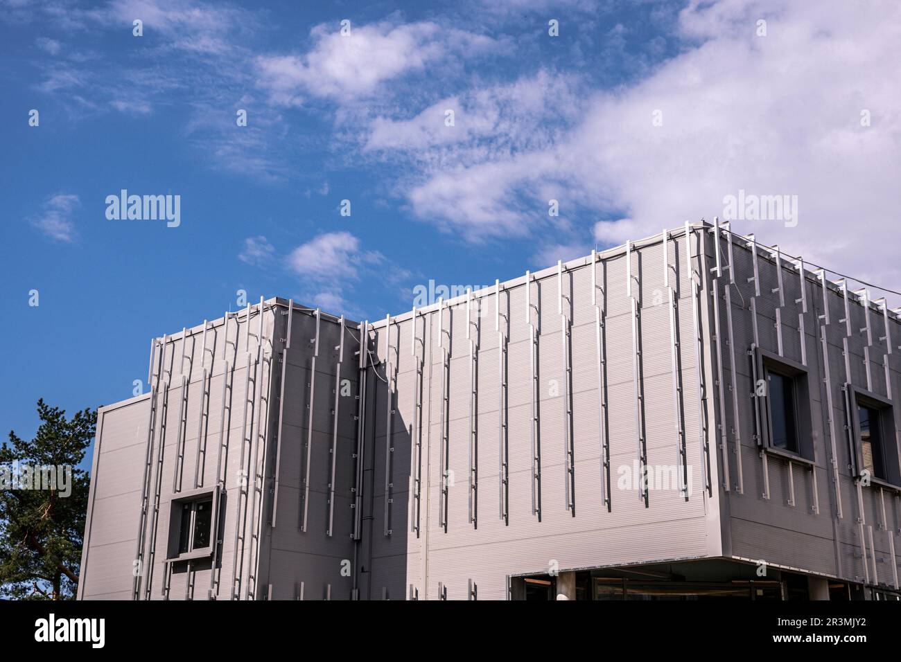 cladding facades with decorative panels. Building house Stock Photo - Alamy