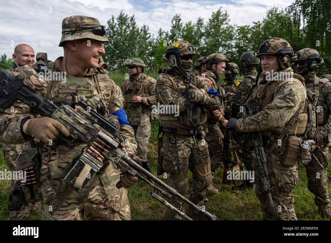 Fighters of Russian Volunteer Corps gather for a break after press ...