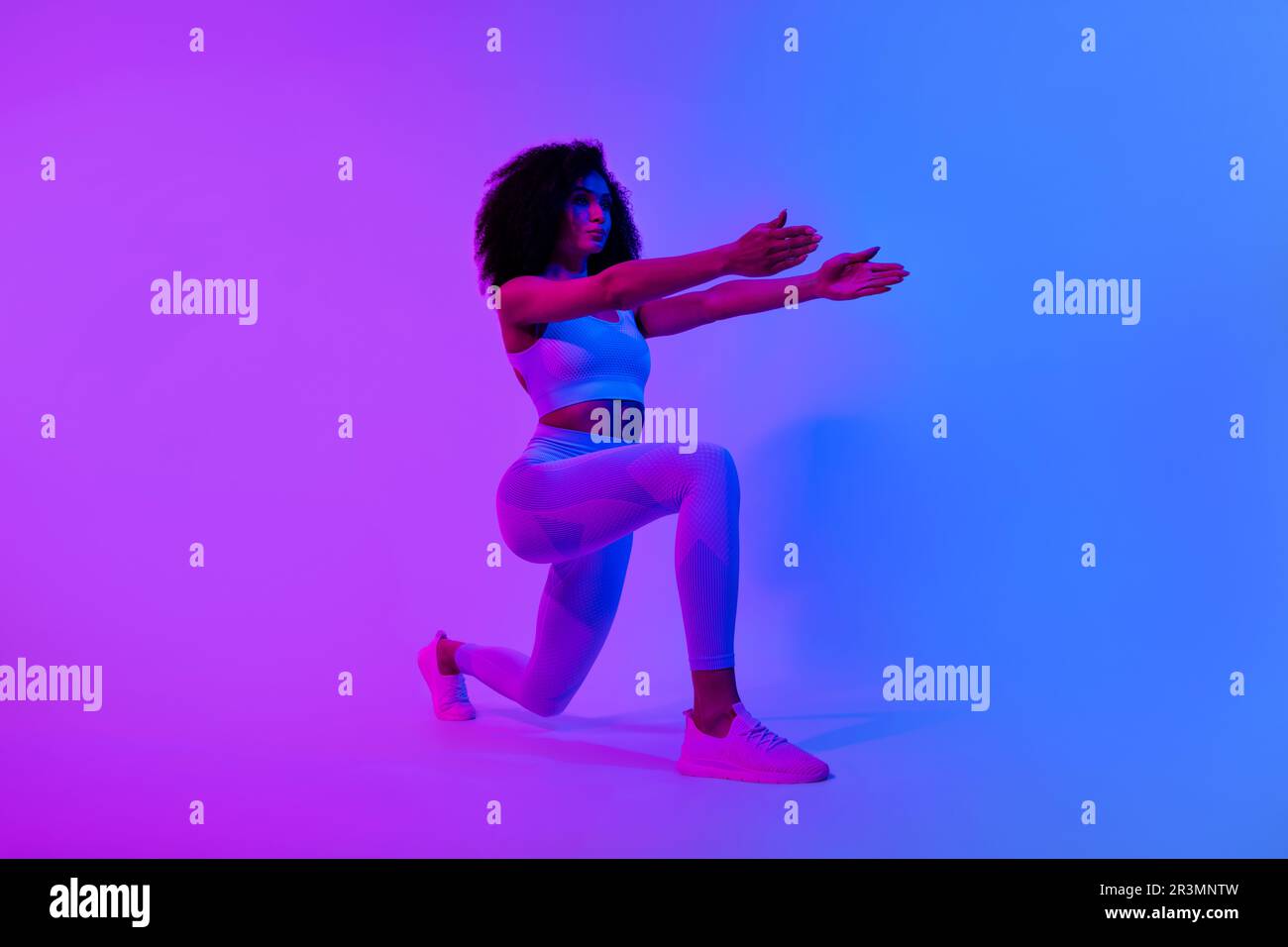 Full size profile photo of concentrated fitness coach girl doing lunges ...