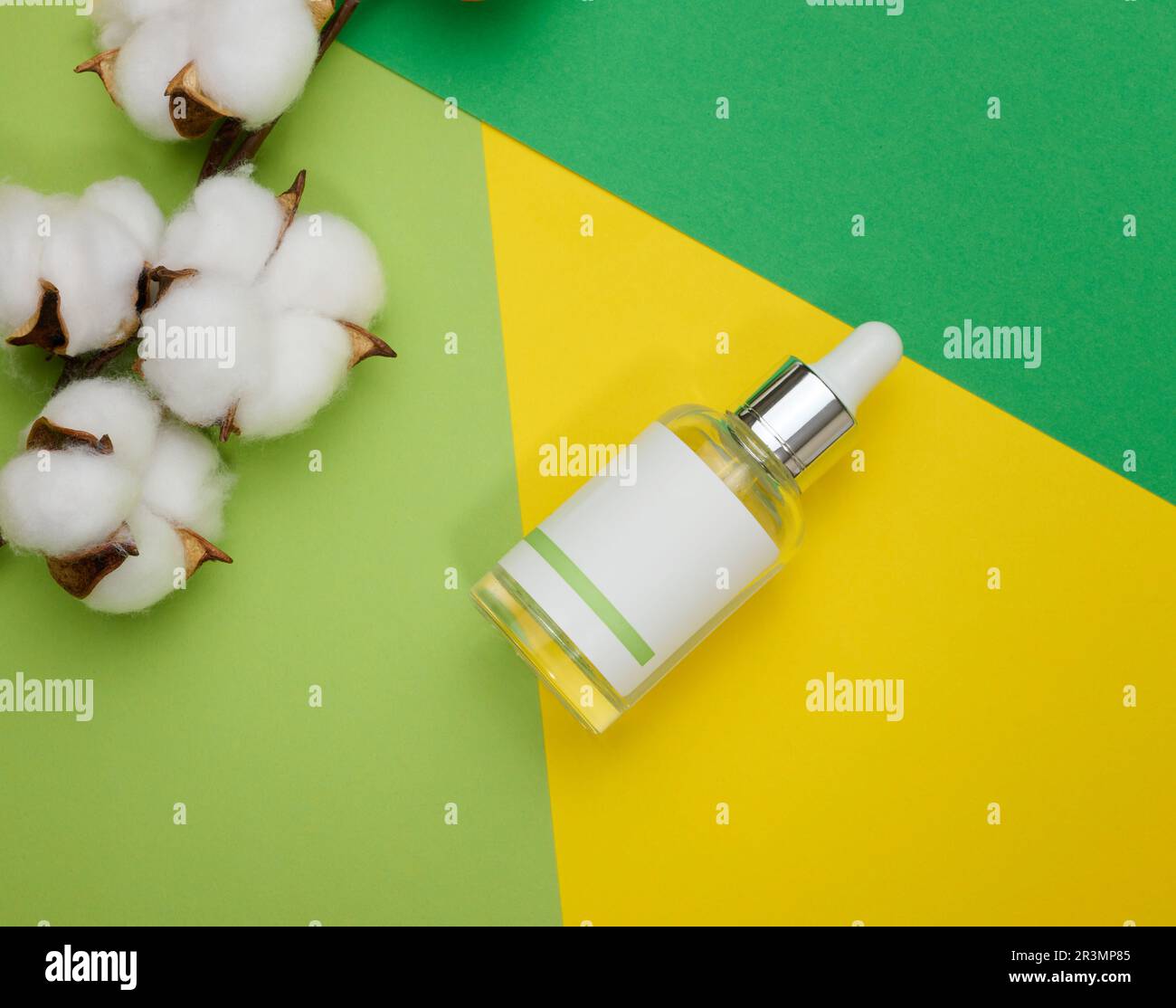 Glass transparent white bottle with a pipette. Container for cosmetics ...