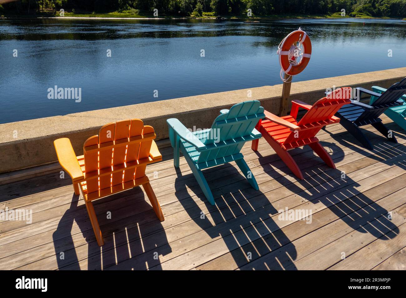 Adirondack chairs on the dock in Hallowell Maine Stock Photo - Alamy