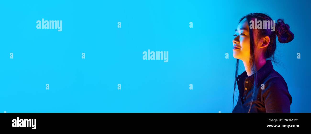 Side view portrait of beautiful, young, korean girl smiling against ...