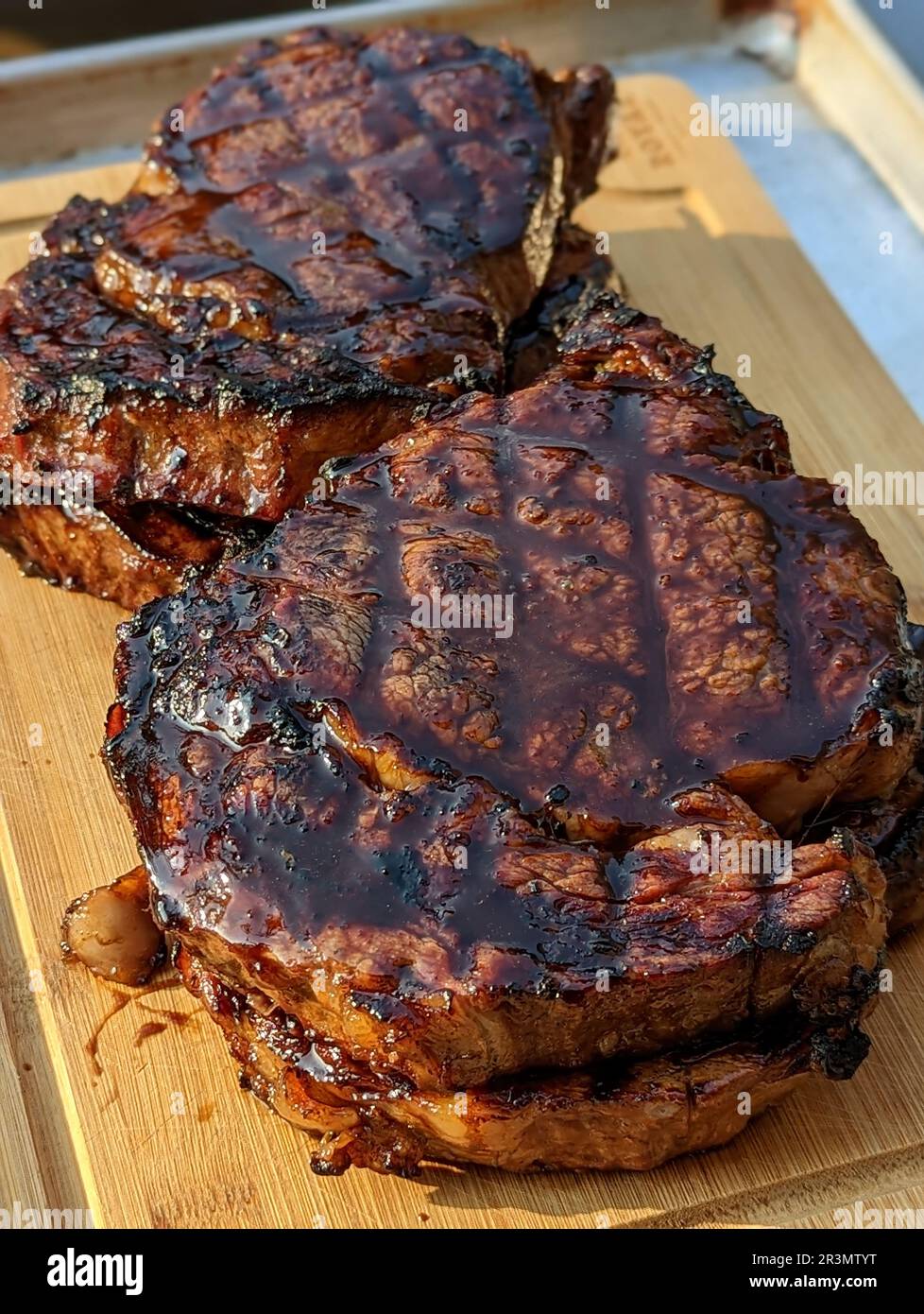 Grilled steak medium rare for family dinner Stock Photo - Alamy