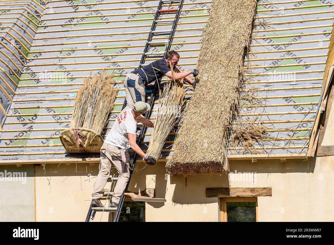 Tatched roof under construction - traditional way of work | Toiture en ...