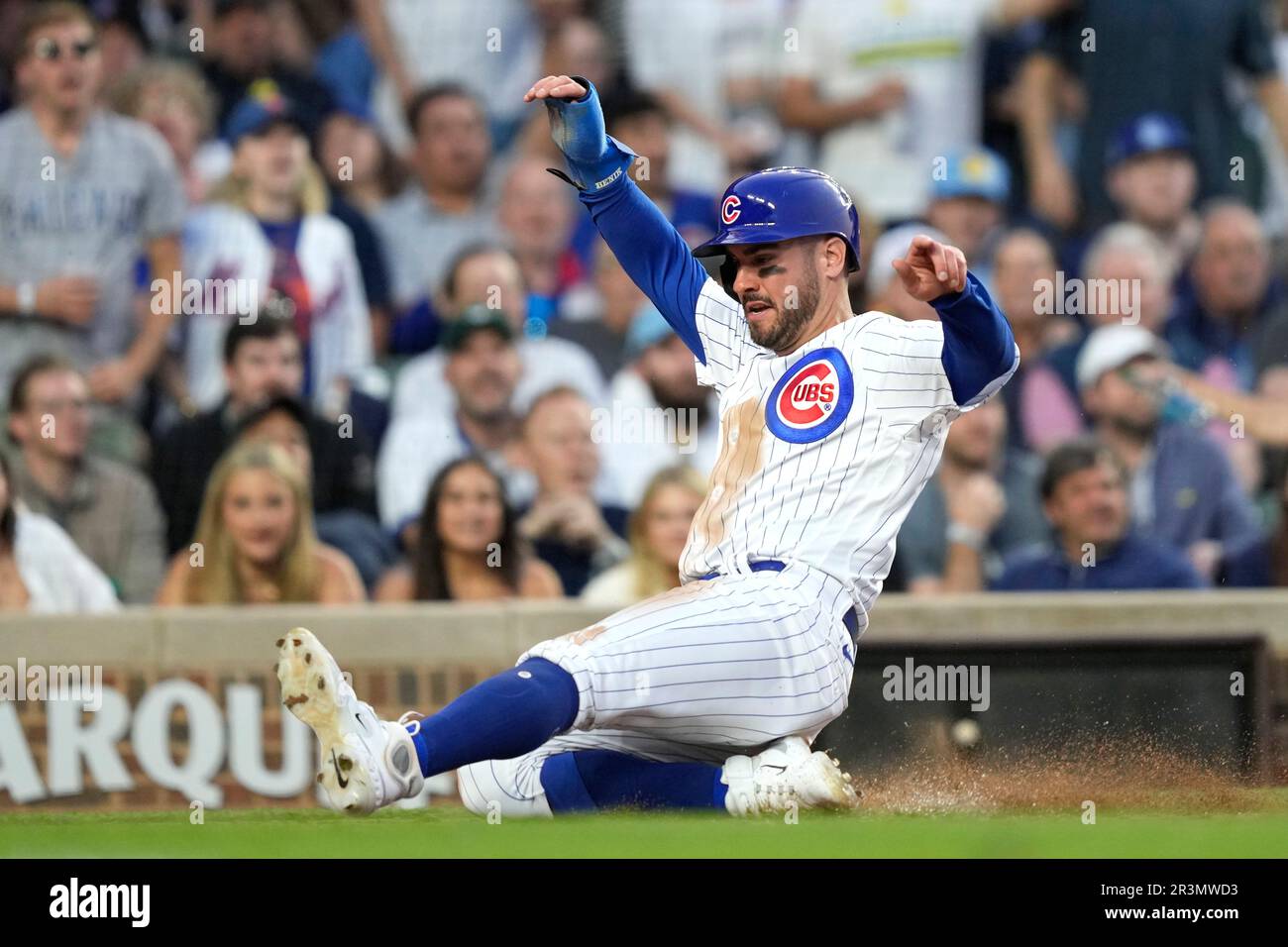 Chicago Cubs' Mike Tauchman scores in a baseball game against the New ...