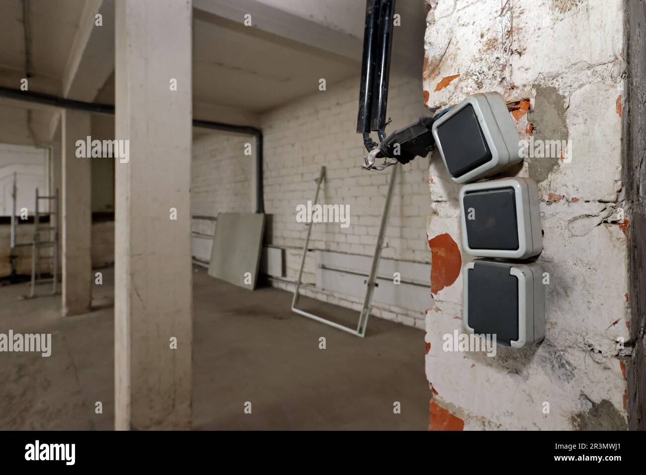 Light switch on a construction site Stock Photo - Alamy