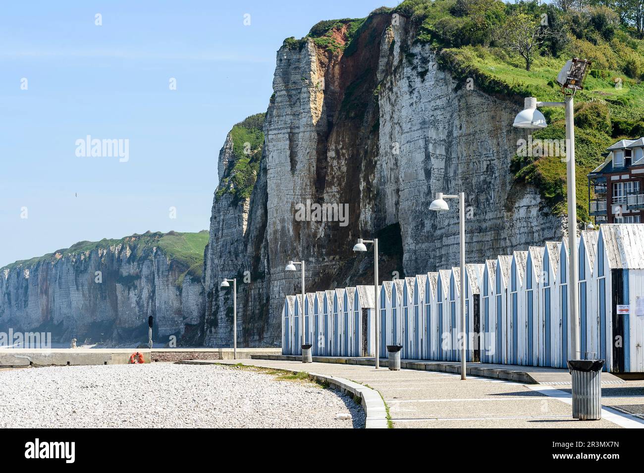 Yport, the pebbles beach, the small boat and the cliffs in front of the ...