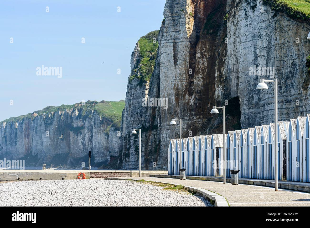 Yport, the pebbles beach, the small boat and the cliffs in front of the ...
