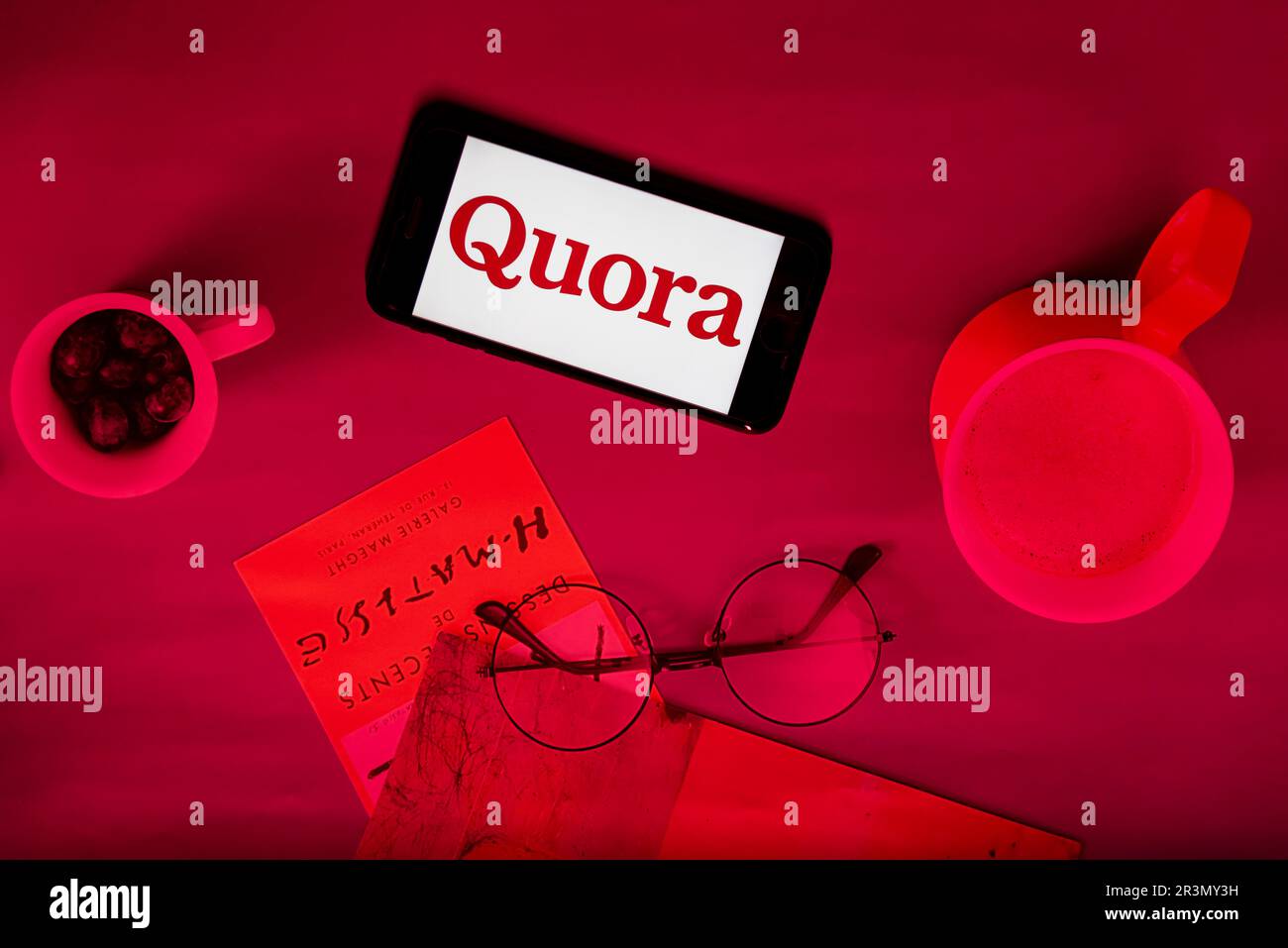 In this photo illustration, the Quora logo seen displayed on a mobile ...