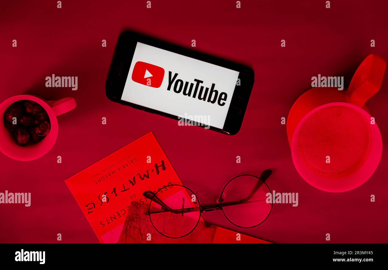 In this photo illustration, the YouTube logo seen displayed on a mobile ...