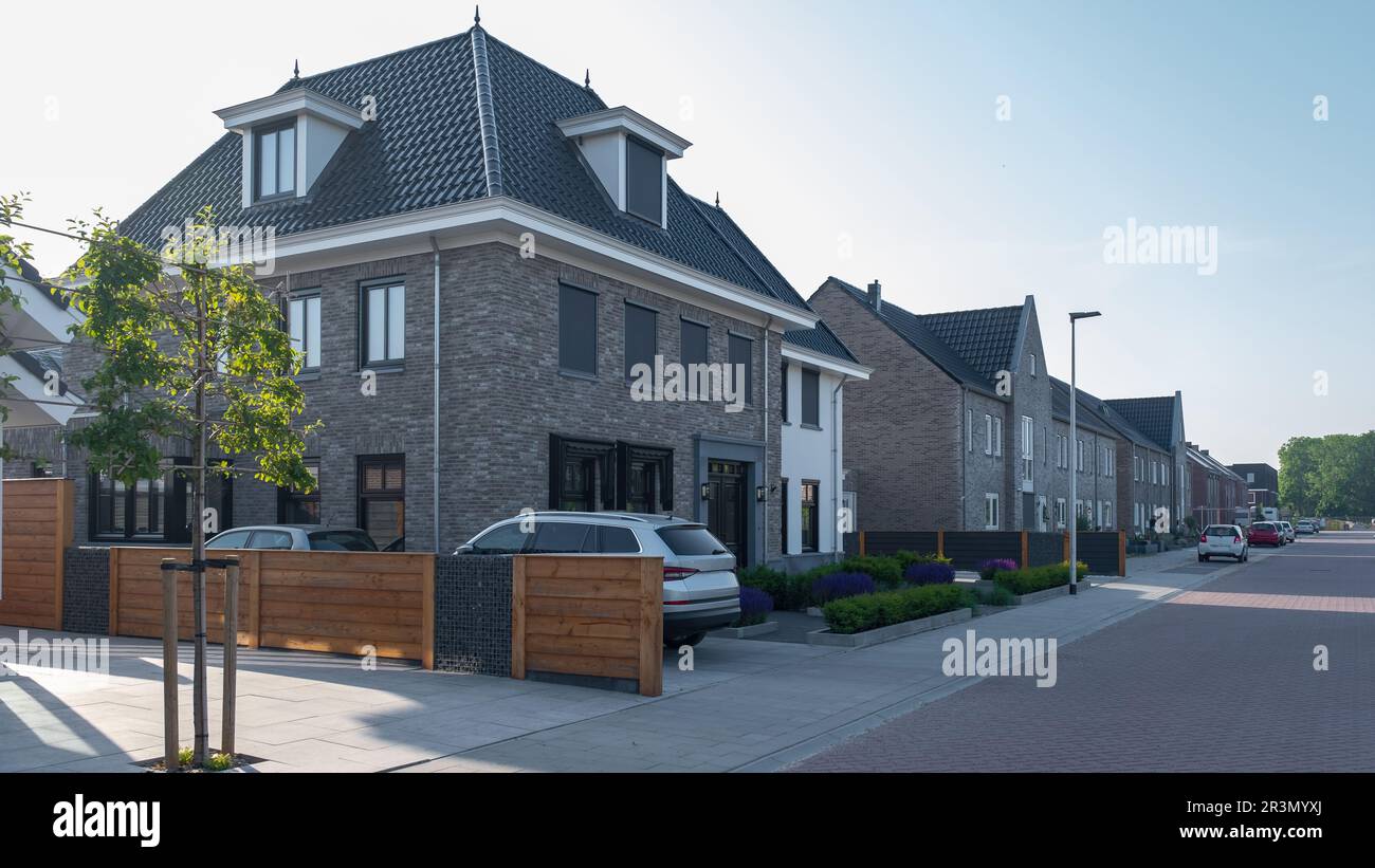 Dutch Suburban area with modern family houses, newly build modern ...