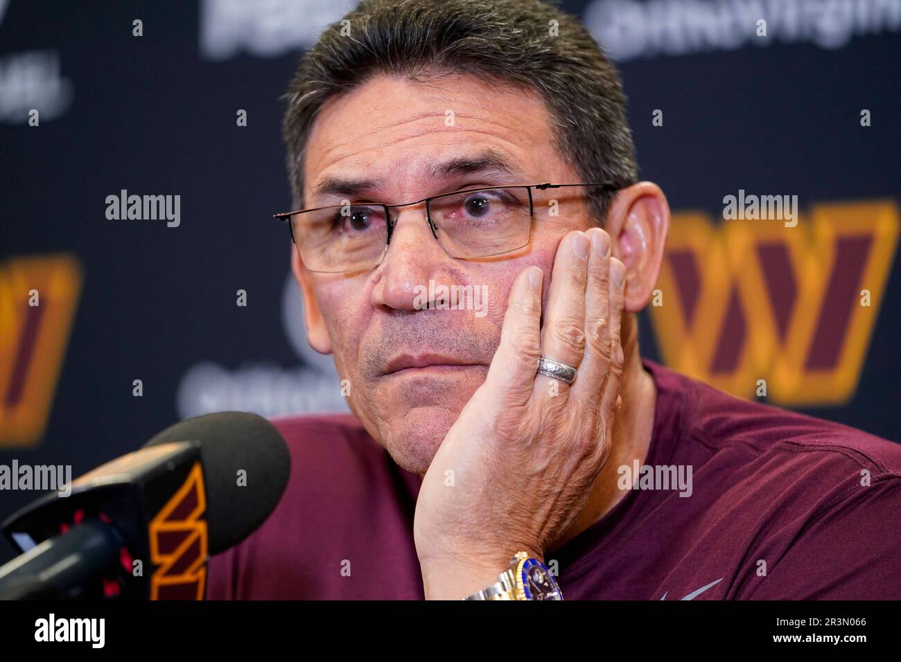 Washington Commanders head coach Ron Rivera listens to a question ... Washington Commanders head coach Ron Rivera listens to a question ...