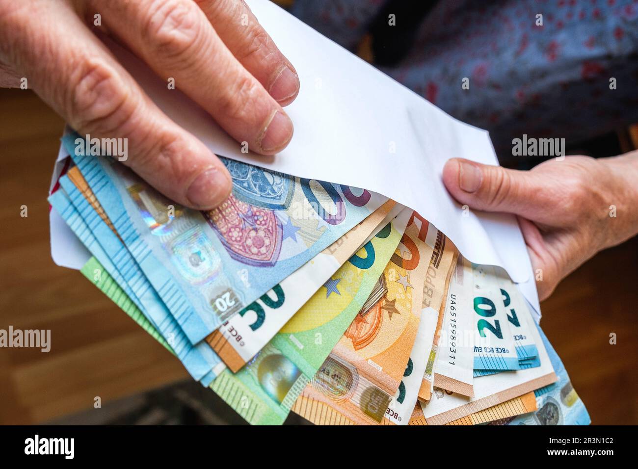 Black salary, the notes and the money pass from an hand to another hand ...