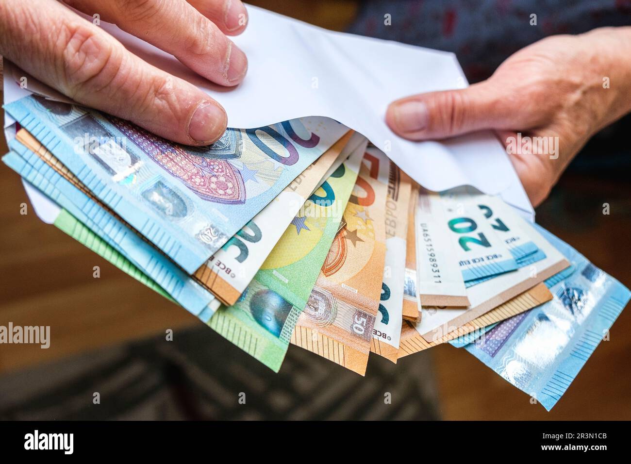 Black salary, the notes and the money pass from an hand to another hand ...